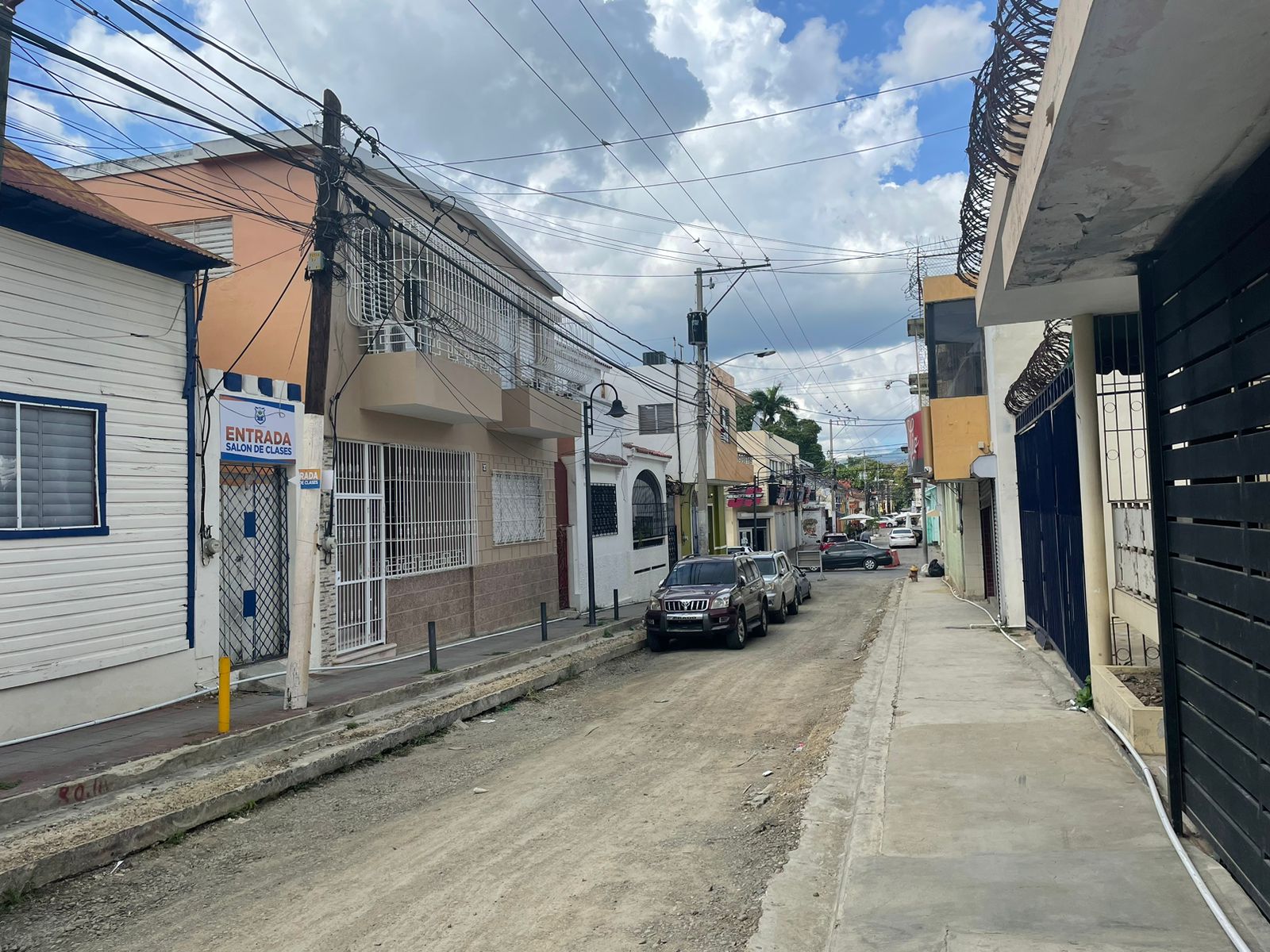 Comerciantes y Residentes Exigen Reparación de la Calle Benito Monción ...
